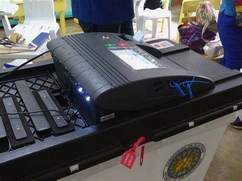 Vote Counting Machine Bogs Down In Tuburan Elementary School Cebu