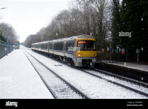 Chiltern Railways Class 168 Diesel Train In Snowy Weather Approaching Warwick Station