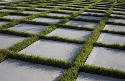 Transform Your Outdoor Space With A Stone And Grass Patio