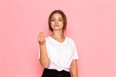 Free Photo A Front View Young Beautiful Female In White Shirt Posing