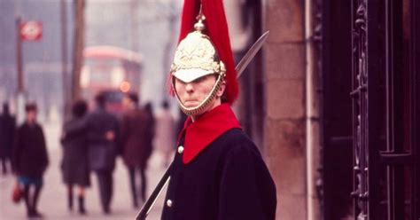 Royal Guard Desperately Tries To Contain His Laughter While Tourist Narrates Fake Story About