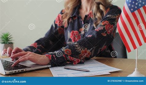 American Woman Consular Officer Giving Passport To Male Immigrant Work