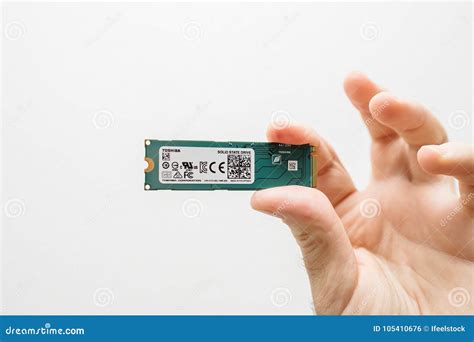Man Hand Holding NVME PCIE SSD Hard Drive Disk With Itsh Adapter Editorial Photo Image Of