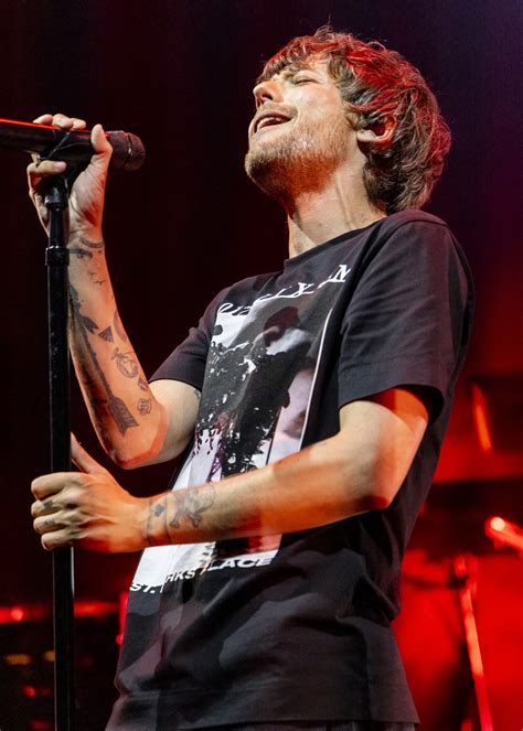 Louis Tomlinson Tattoo Kevin