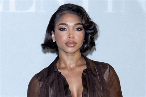 Lori Harvey Serves Chic Style In Shearling Coat And Clear Wedge Booties