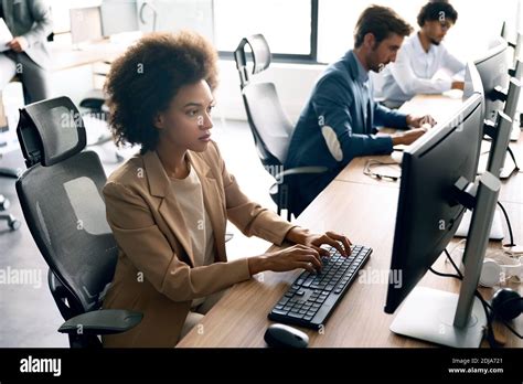 Programmers Cooperating Brainstorming At Information Technology Company