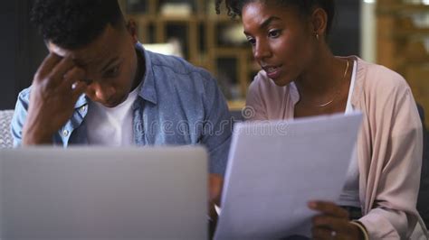 Couple Documents And Stress For Home Bills Financial Crisis Or Debt
