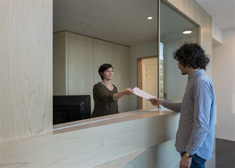 Joshua Florquin Creates Angular Wooden Joinery For Doctors Surgery