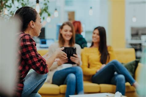 Group Of Multi Ethnic Colleagues Working On Desktop Computers Laptop And Sharing Their Ideas In