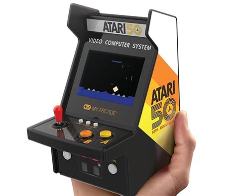 A Tiny Arcade Machine That Plays 100 Atari 2600 Classics