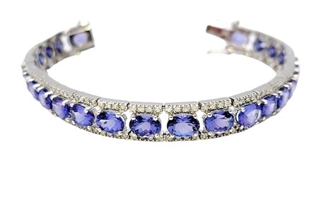 2675 Carat Total Oval Tanzanite And Pave Diamond Line Bracelet In