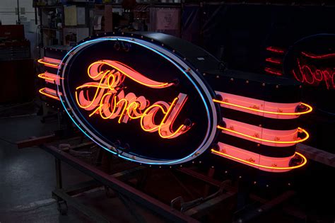 Porcelain And Neon Signs By Vault Vault Custom Garage Design
