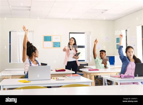 Students Engage In A Classroom Activity In High School With Copy Space
