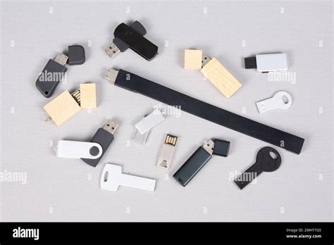 Flash Drive Several Usb Keys Of Different Shapes And Models In Silver Black And Wooden Grey