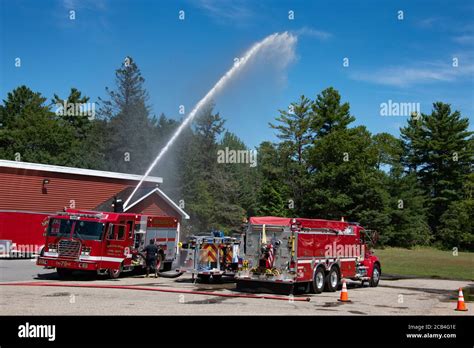 Fire Trucks Spraying Water