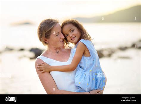 Mother And Daughter On Tropical Beach Summer Sea Vacation Happy