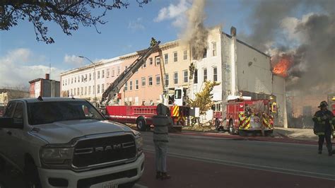 Baltimore Bystander Helps Woman Escape From Vacant Home Fire Its
