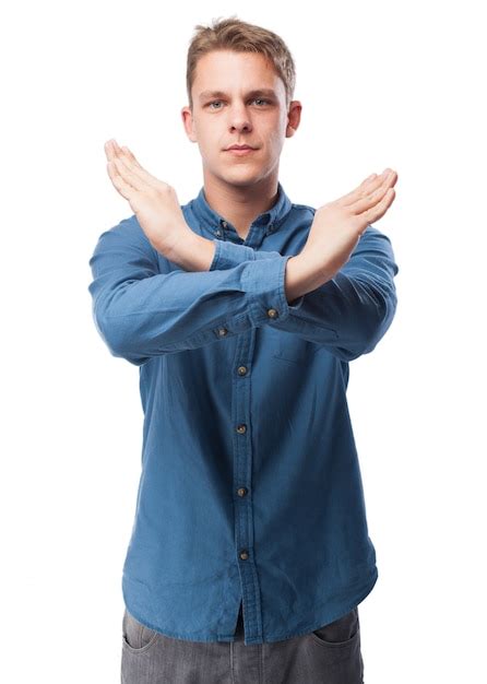 Man Making An X With Arms Photo Free Download