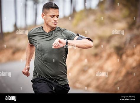 Fitness Smartwatch Or Man Running For Exercise Cardio Training Or Workout In Nature Tracking