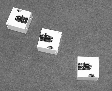 video still of the robots moving in formation the arrow indicates the