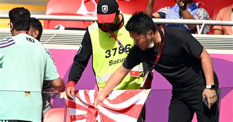 日 욱일기에 민감한 건 韓 Fifa 뿐 관중석 쓰레기 수거 선행만 부각