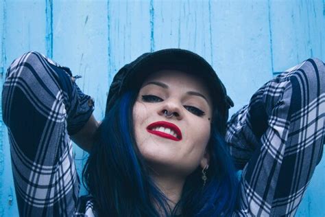 Premium Photo Hipster Girl On Blue Wall Premium Photo Hipster Girl On Blue Wall