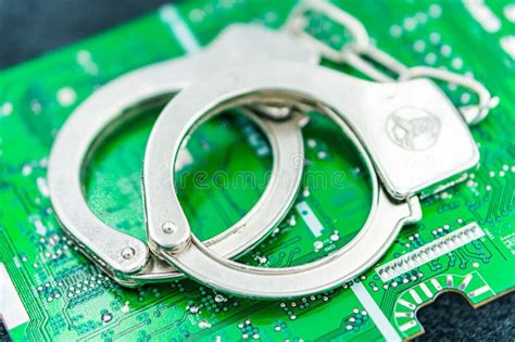 Cybercrime The Concept Of Cybercrime Handcuffs Lie On A Computer