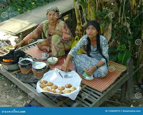 Cambodian Women People Biking Bicycle On Small Street At Outdoor Go To