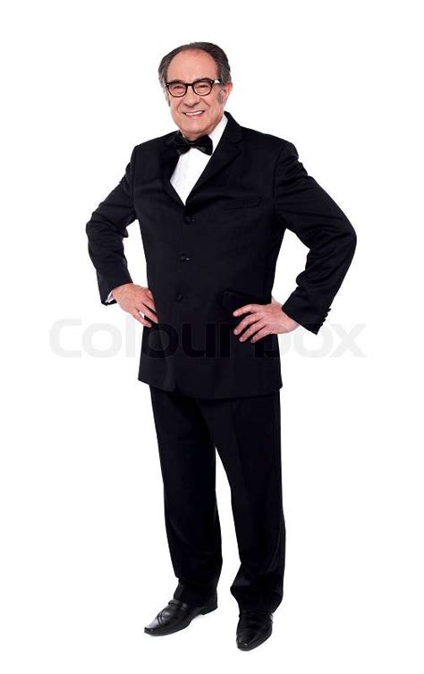 Studio Shot Of A Stylish Old Man Posing Stock Photo Colourbox