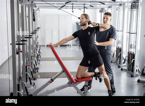 Man Doing Exercises On Decompression Simulators With The Help Of