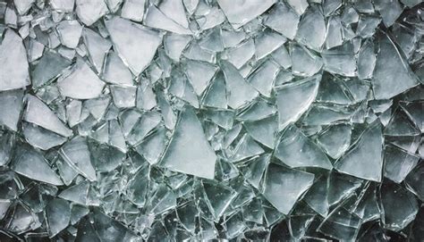 Abstract Background With Glass Broken Into Large Number Of Pieces And