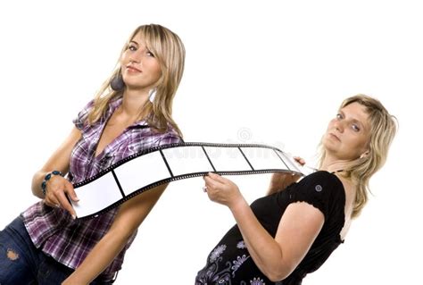 Mother And Daughter Holding Film Strip Picture Image 10334212