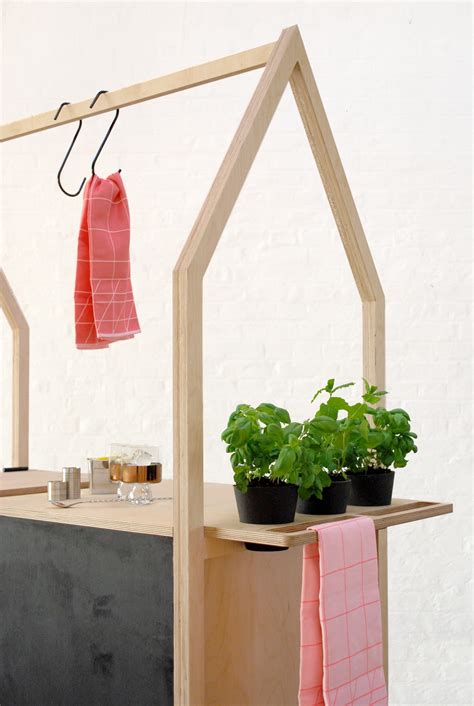 HÛt Creates Mobile Plywood Gin Trolley To Serve Its Architecture Office