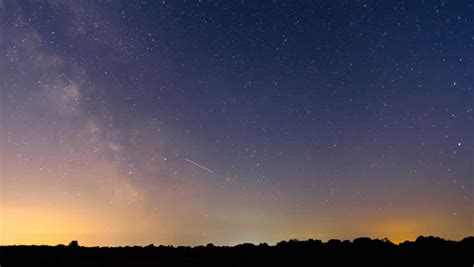Stars Tracking Across The Night Sky Until Dawn Time Lapse With Wispy