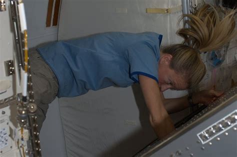 Installing Data Cables On The Space Station