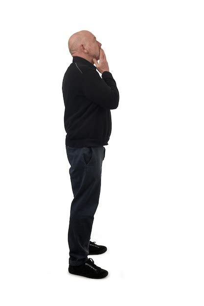 Premium Photo Side View Of A Man Thinking And Looking Up On White Background