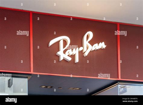 Close Up Of Ray Ban Logo Sign At Their Store In A Shopping Mall In