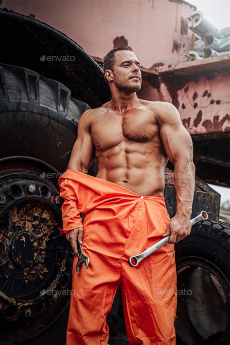 Holding Two Wrenches Muscular Engineer With Naked Torso Stock Photo By Fxquadro