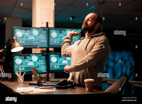 Aggressive Male Hacker Throwing Mouse In Office Failing To Hack