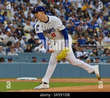 Los Angeles Dodgers Pitcher Roki Sasaki 11 Rests In The Dugout Between The Fifth And Sixth