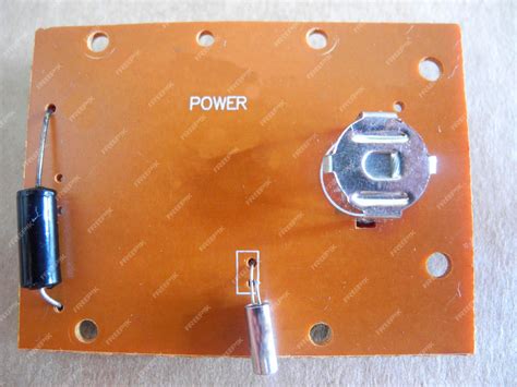 Premium Photo Miniature Lcd Panel On The Motherboard Detail Of An