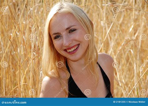Portrait Of Blonde Young Woman In Bikini With White Surfboards On Background Royalty Free Stock