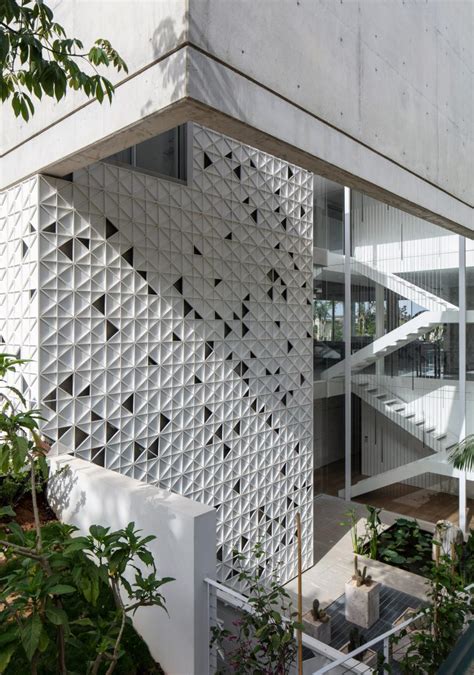 Triangles Of Light Animate Perforated Facade Of House By Pitsou Kedem