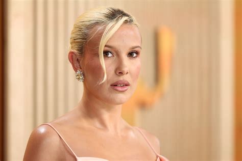 Millie Bobby Brown Debuts A Fresh Hair Look In A Sparkly Pink Bra