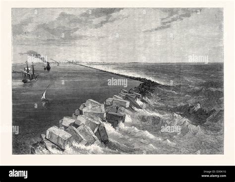 The Isthmus Of Suez Maritime Canal Breakwater At Port Said And