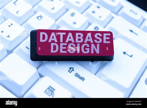 Sign Displaying Database Design Word Written On Organisation Of Data According To A Database
