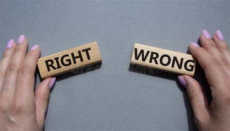 Right Or Wrong Symbol Concept Word Right Or Wrong On Wooden Blocks Businessman Hand Beautiful