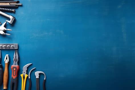 Premium Photo Versatile Toolkit Displayed On A Vibrant Blue Background A Top View With Ample