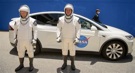 Bob And Doug Pose In Front Of Their Ride To Pad A During The Final Dry Dress Rehearsal Before