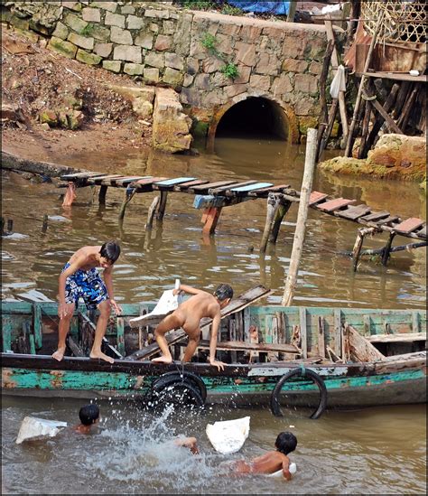 Boys Swimming In River